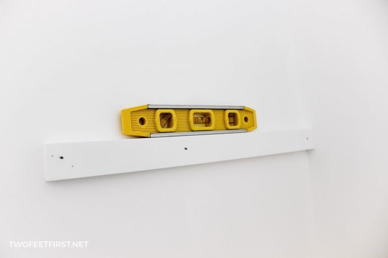 Build a simple wall to wall shelves | TwoFeetFirst