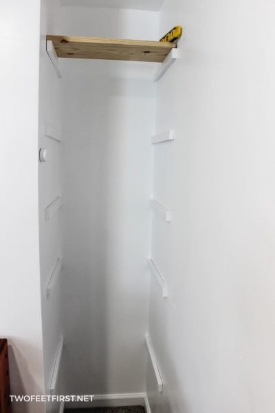 Build a simple wall to wall shelves | TwoFeetFirst