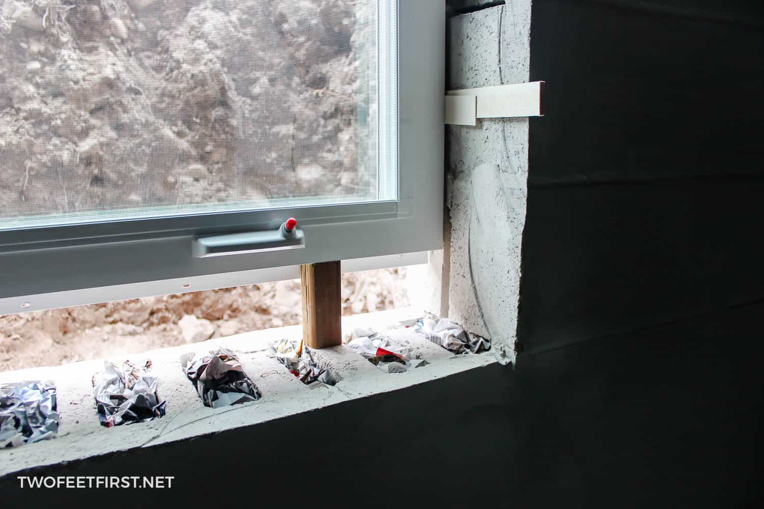 The process of enlarging basement windows | TwoFeetFirst
